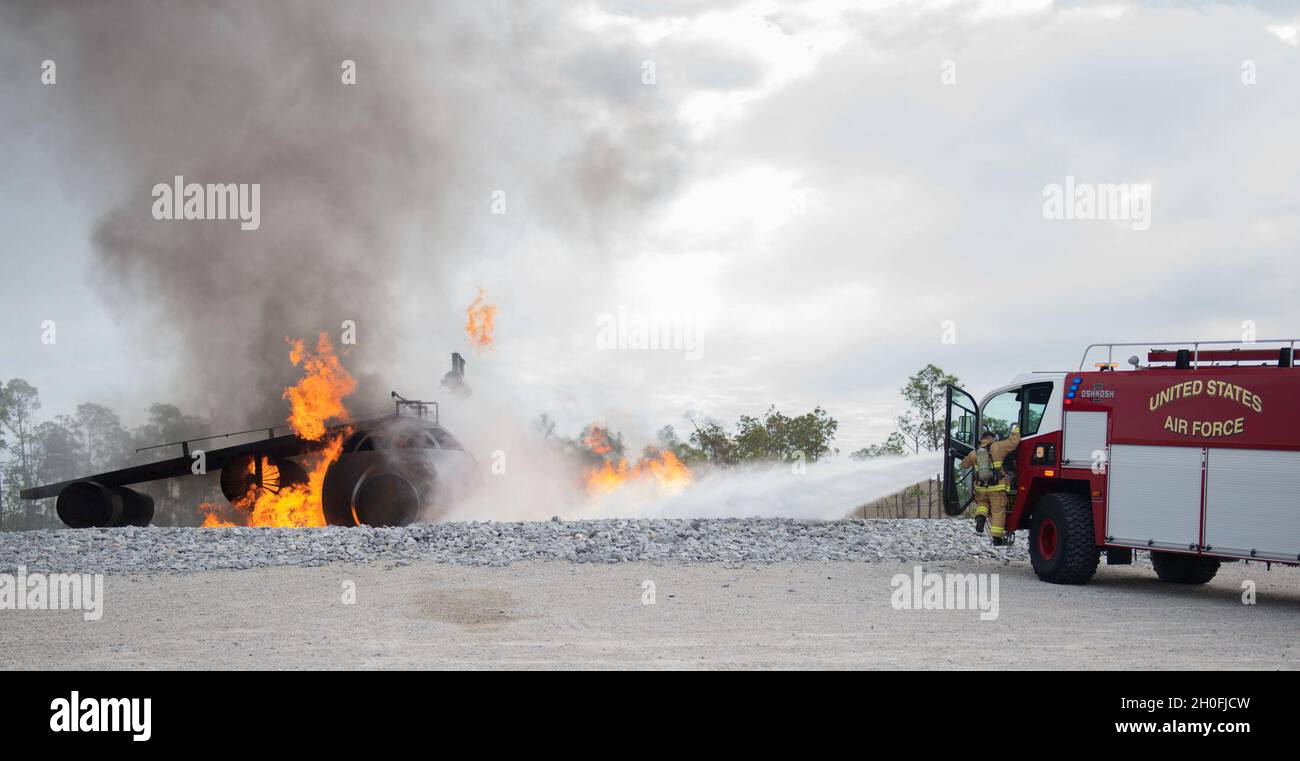 U.S. Air Force Airmen participate in a live fire training simulation at ...