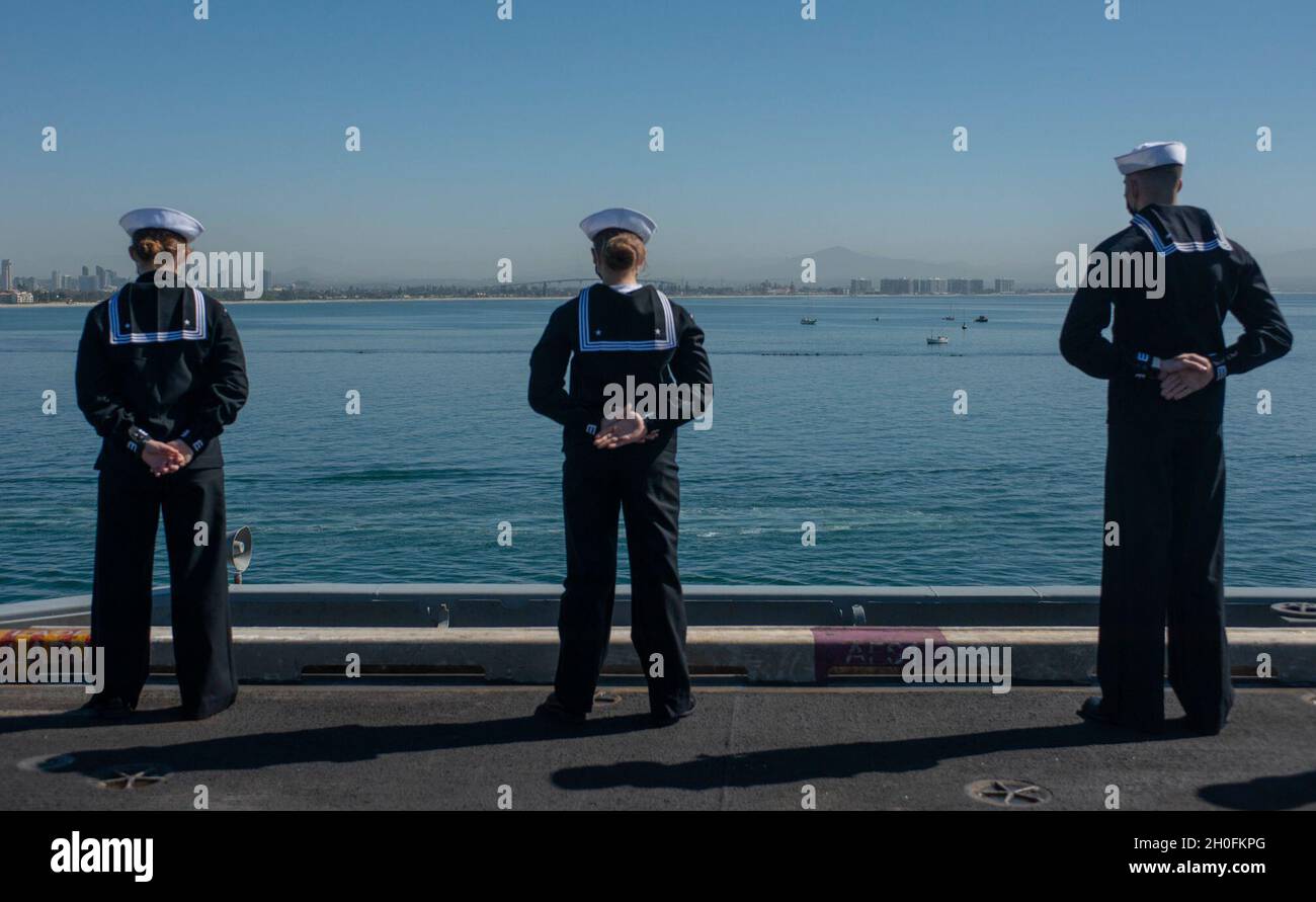 210226-N-BK664-0168 SAN DIEGO (Feb. 26, 2021) Sailors man the rails on ...