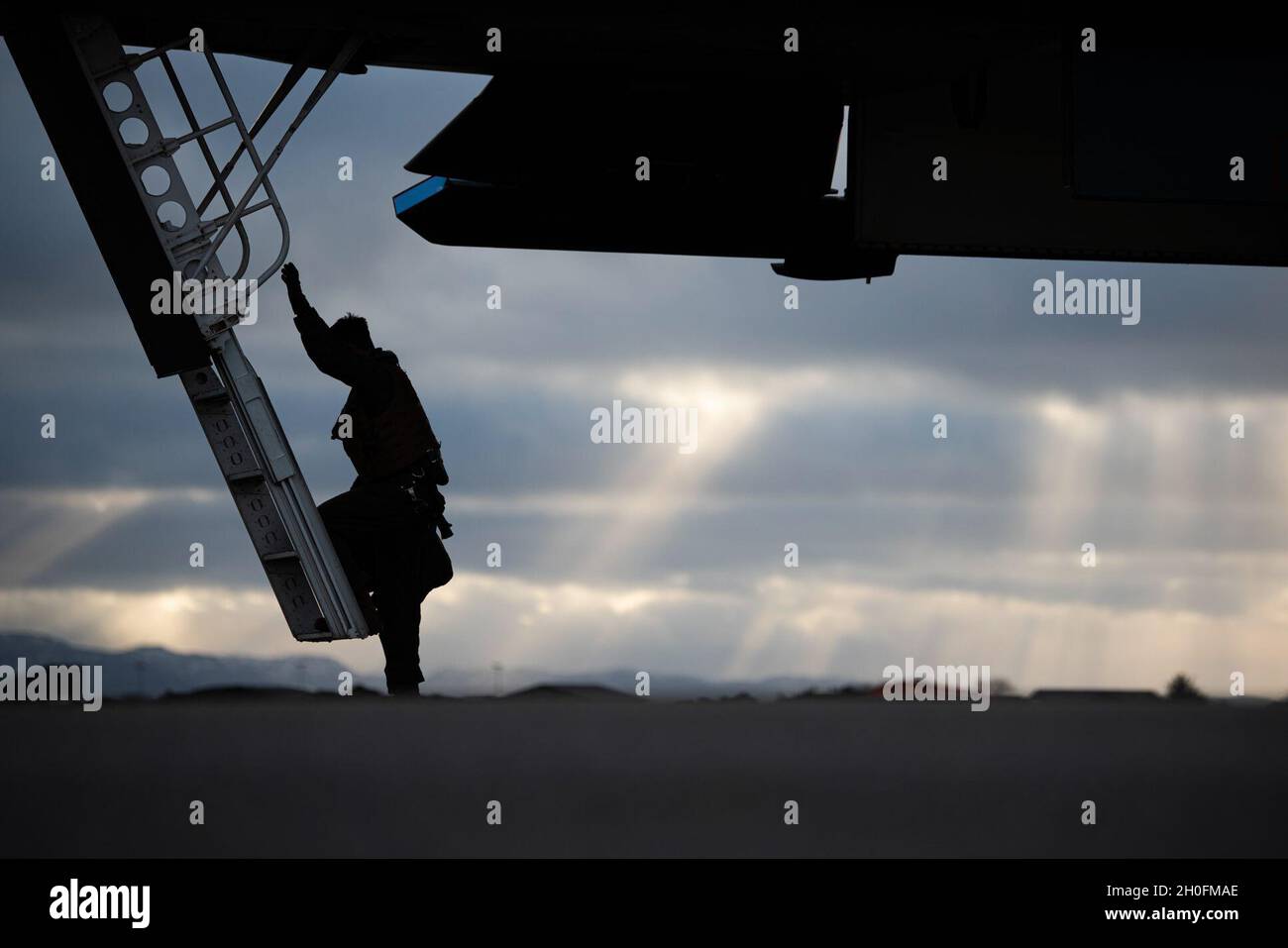 A pilot assigned to the 9th Expeditionary Bomb Squadron exits a B-1B ...