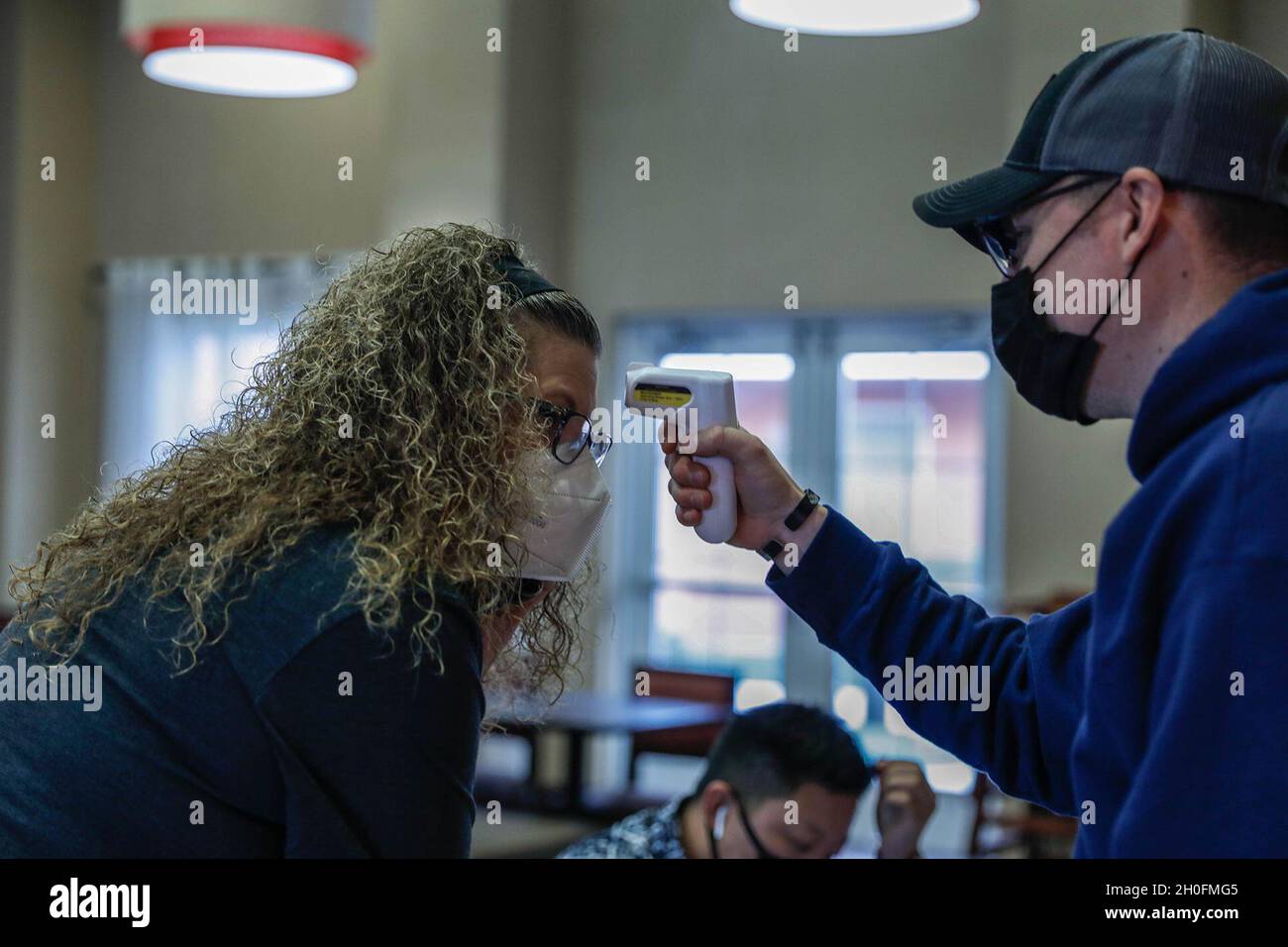 U.S. Army Capt. Teresa Heredia (left), critical care nurse, and Cpl ...