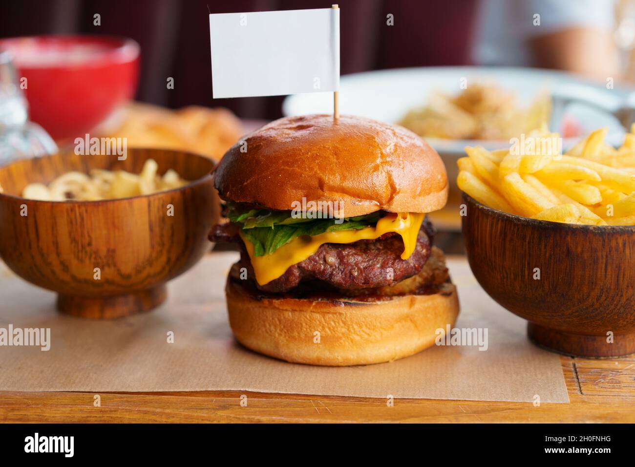Still life with burger fast food menu and french fries Stock Photo - Alamy