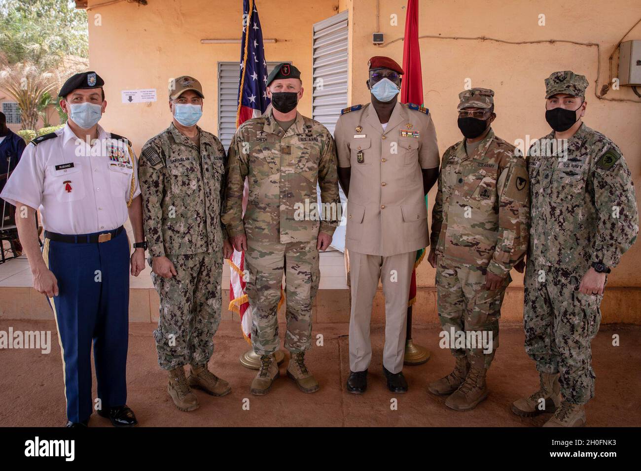 U.S. Army and Burkinabe soldiers take a group photo after the ...