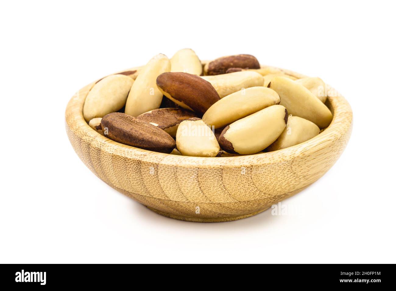 bowl with brazilian chestnut, on white insulator background. Brazil ...