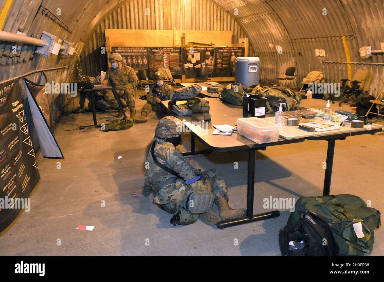 Airmen from the 78th Air Base Wing take defensive positions inside a ...