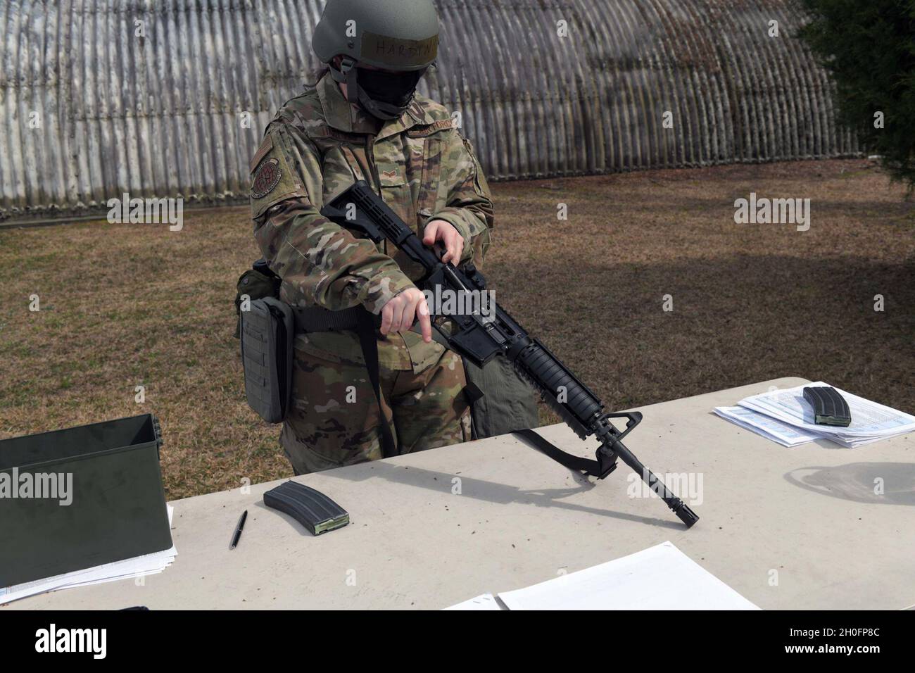 SrA Angel Hardin, 78th LRS performs a functional test on an M-4 carbine ...