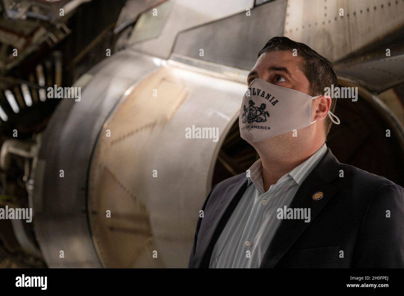 Pennsylvania State Sen. Devlin Robinson looks at a C-17 Globemaster III ...