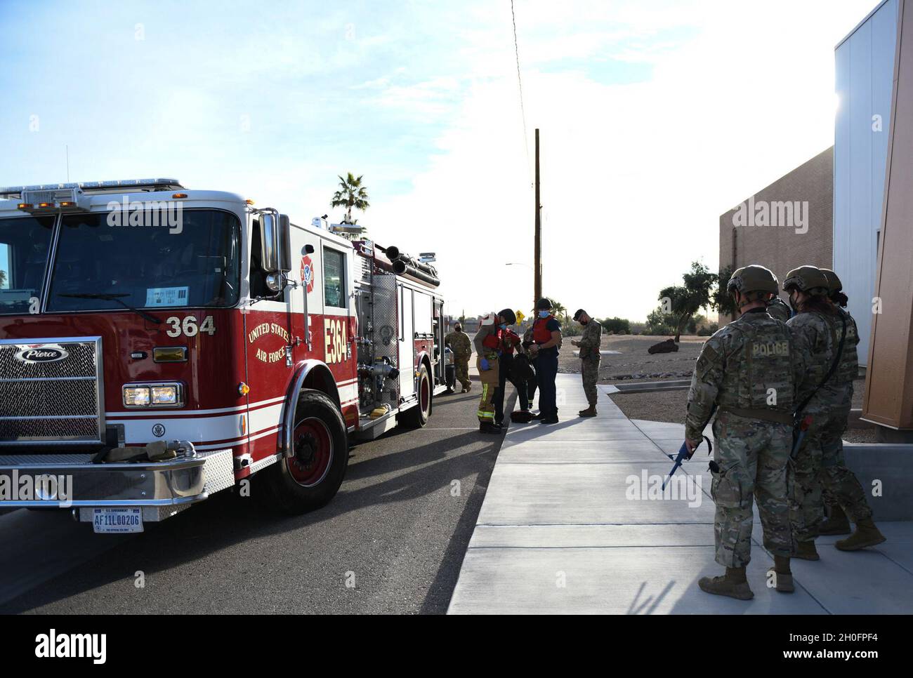 Airmen from the 56th Security Forces Squadron and the 56th Civil Engineer Squadron arrive on the ...