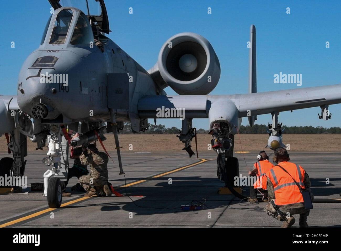 Airmen assigned to the 23d Wing refuel and conduct a weapons upload on ...