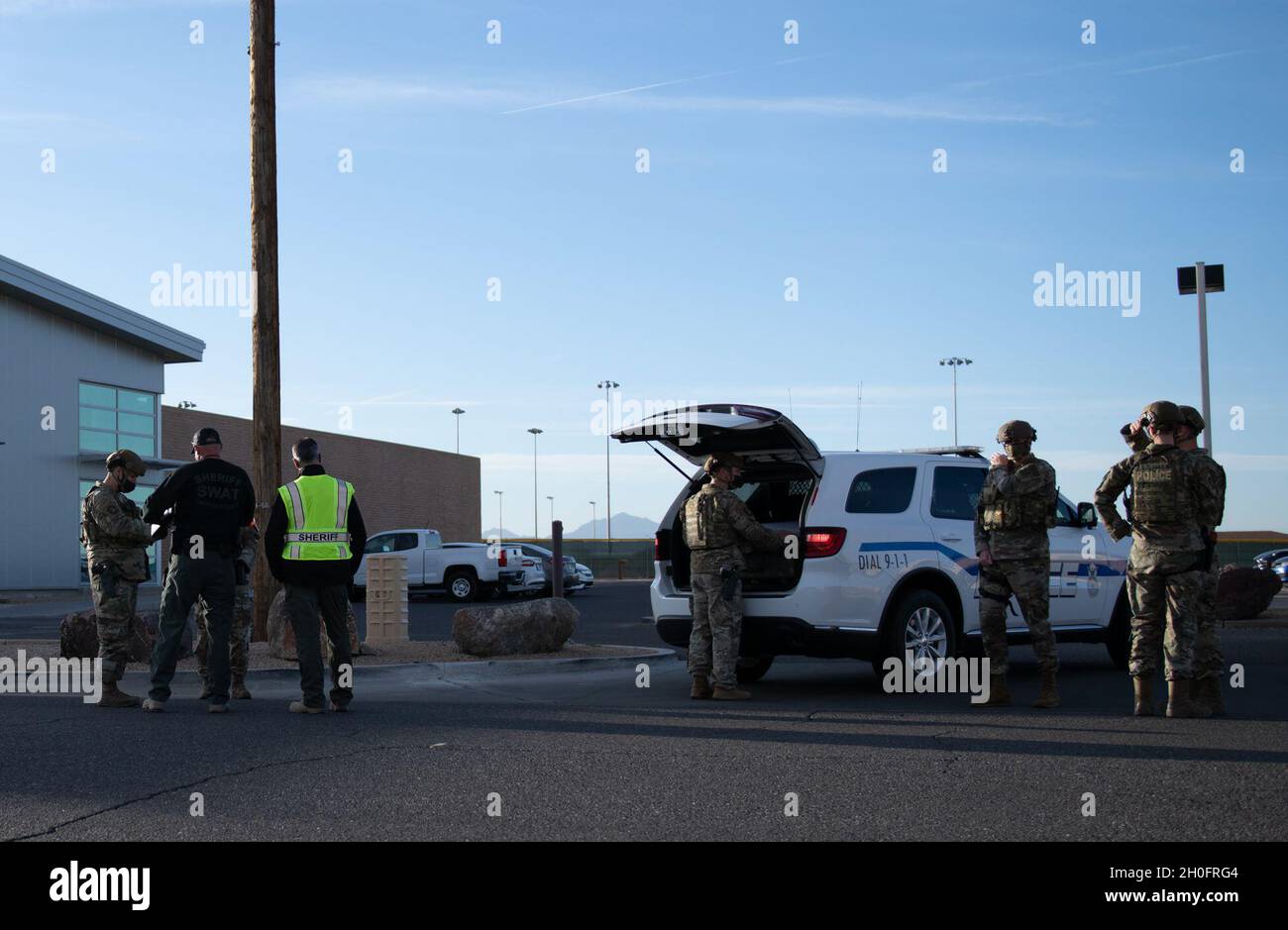 Airmen from the 56th Security Forces Squadron and officers from the ...