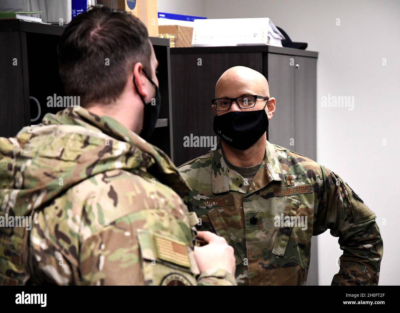 Lt. Col. Antonio Ortiz-Guzman, 94th Airlift Wing chaplain, speaks to a ...
