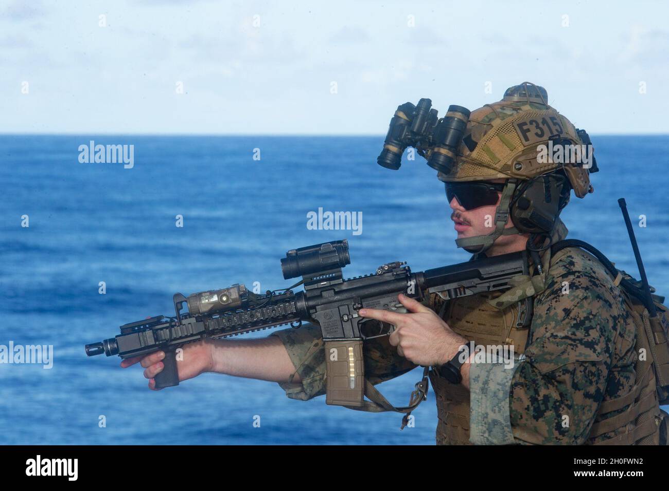 U.S. Marine Corps Lance Cpl. Joseph DeMarcus, a combat photographer ...