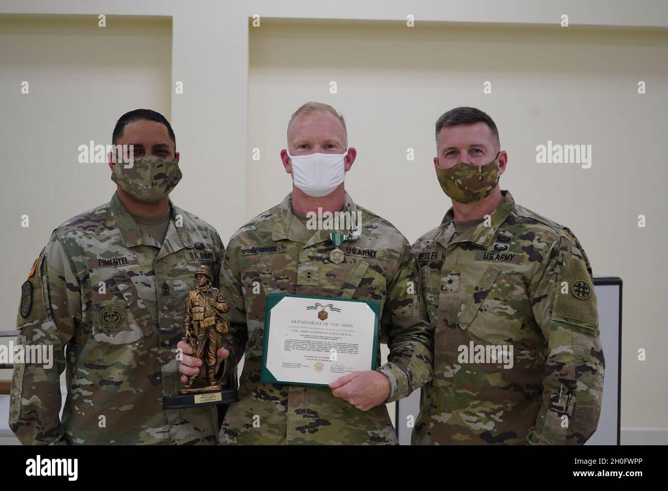 Chief Warrant Officer Two Thomas Downer [Center] receives and Army ...