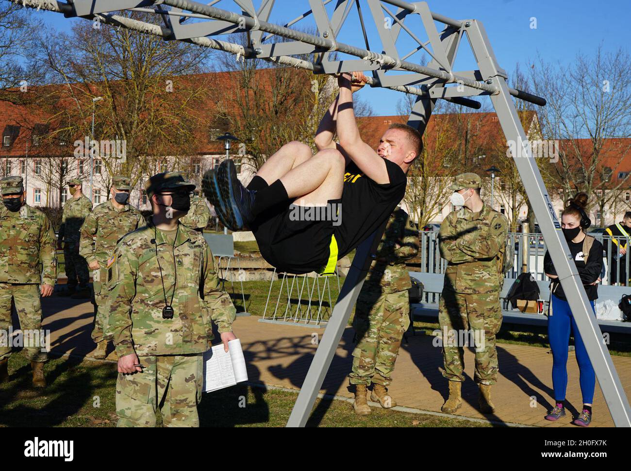 A Soldier completes a leg tuck during the Army Combat Fitness Test Feb ...