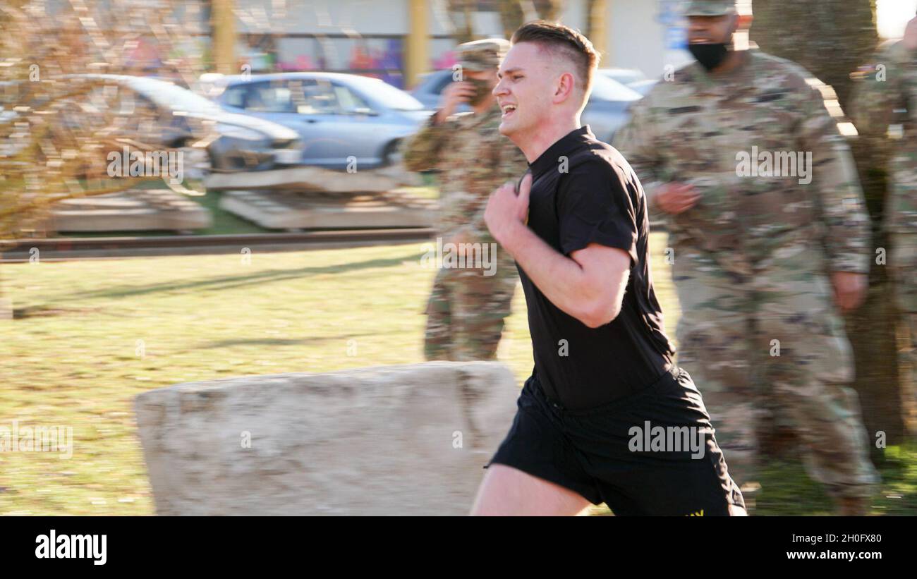 Sgt. David Baker, USAG Ansbach, runs towards the finish line on Feb. 28 ...