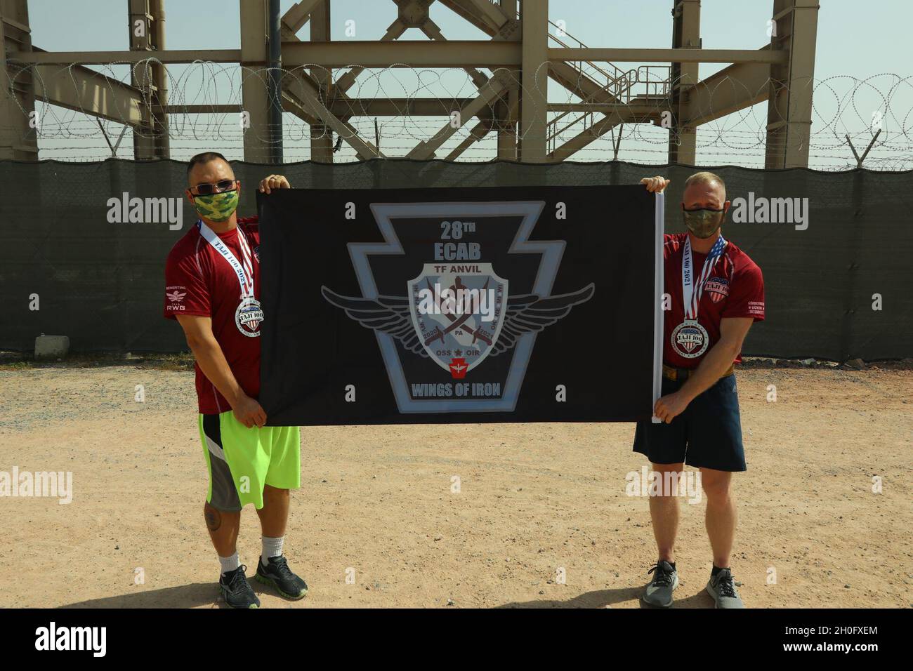 U.S. Army Master Sgt. John Paul Karpovich, left, and Capt. Samuel ...