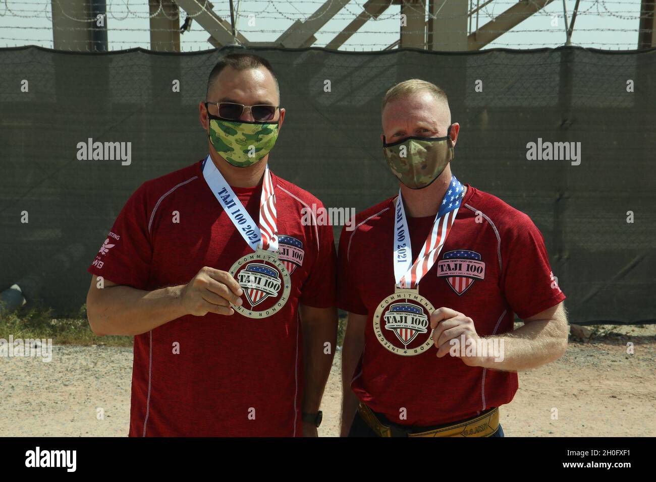 U.S. Army Master Sgt. John Paul Karpovich, left, and Capt. Samuel ...