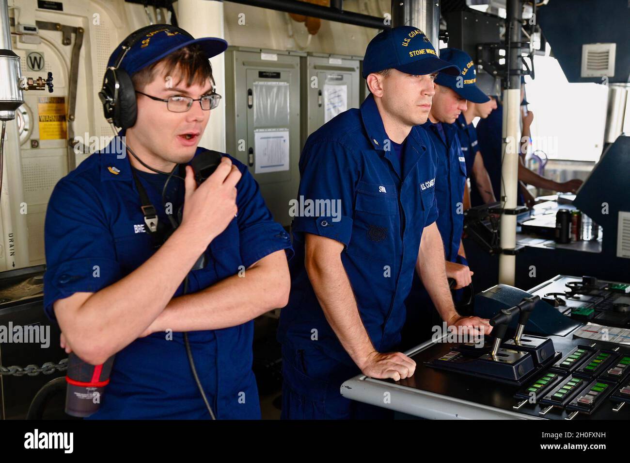 U.S. Coast Guard Petty Officer 3rd Class Morgan Swaim and Petty Officer ...
