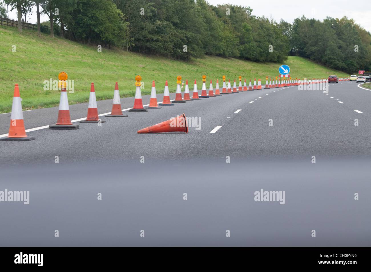 traffic cone hazard on motorway - UK Stock Photo - Alamy