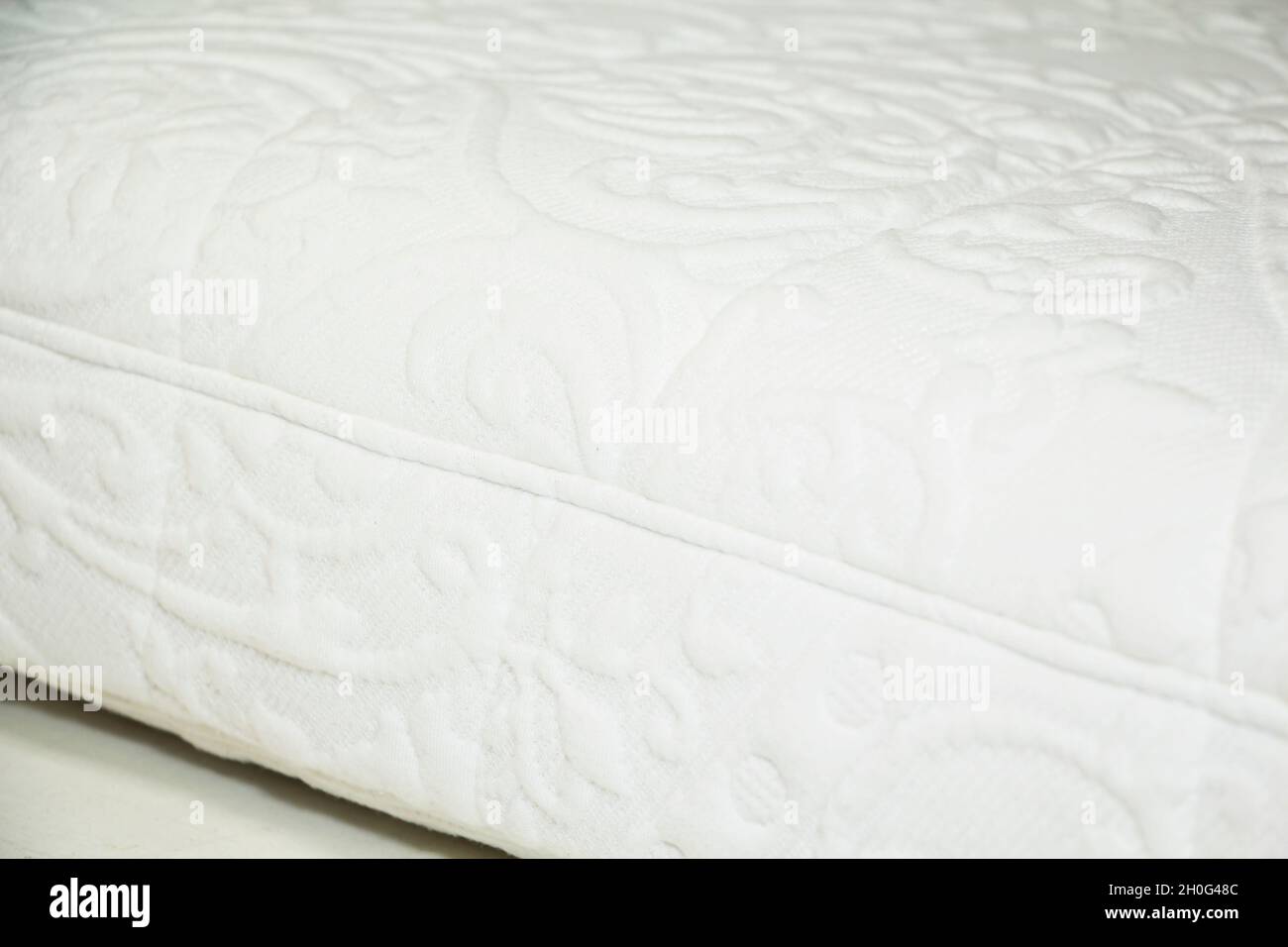 Close-up of the mattress background, white mattress fabric with ...