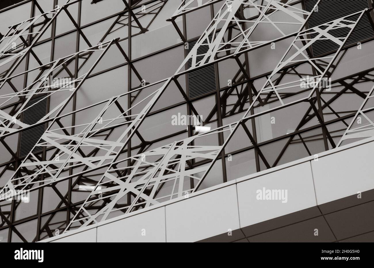 Grayscale of an abstract glass facade of a modern building Stock Photo ...
