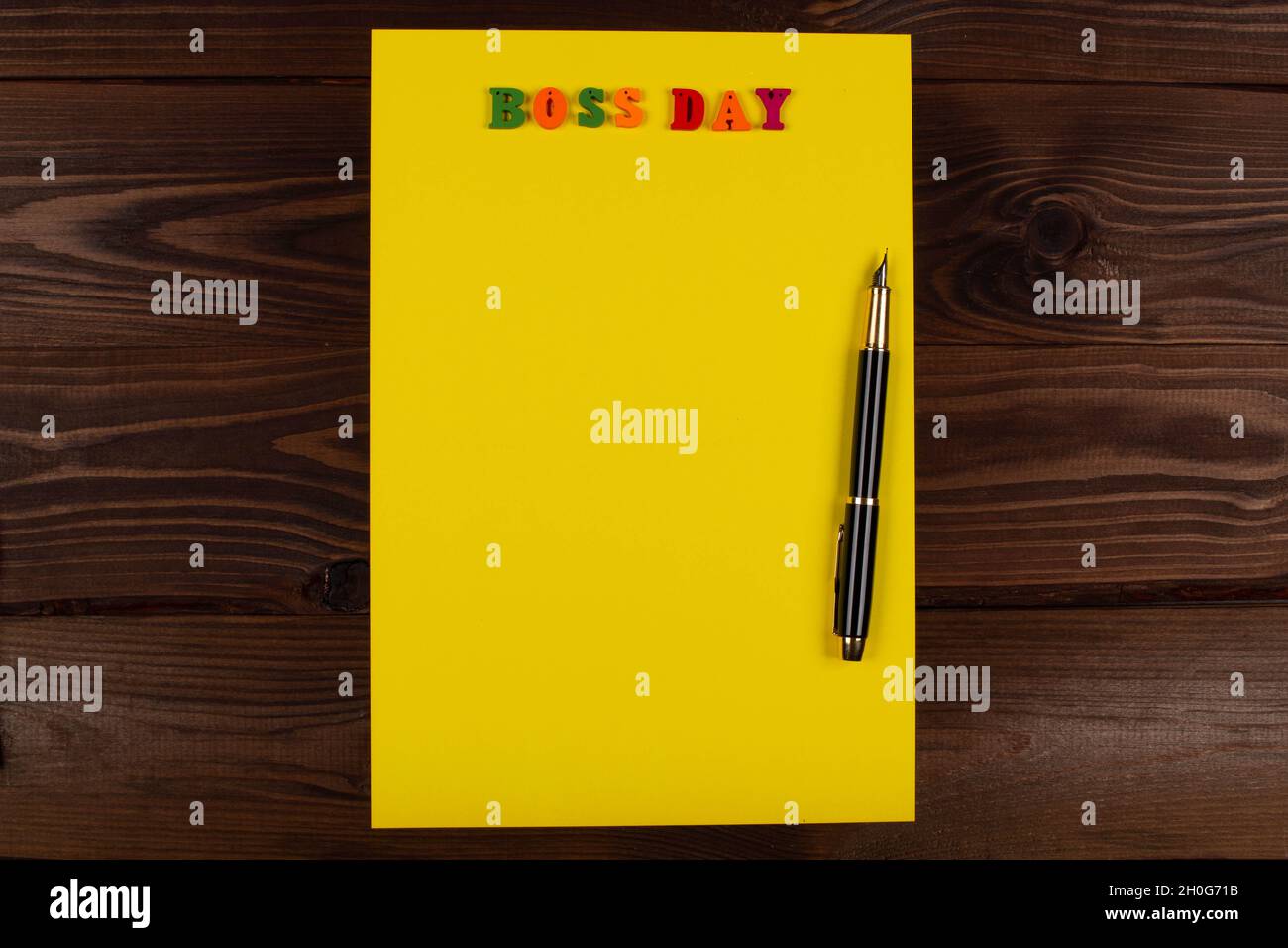 National Happy Boss Day. Multicolored colorful letters in a yellow ...