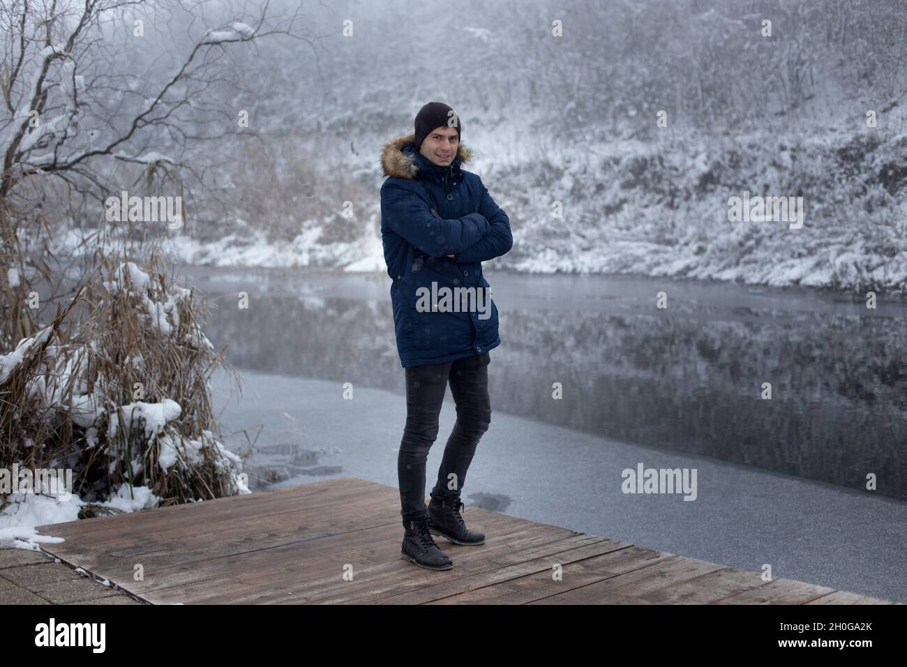 Portrait young man standing frozen hi-res stock photography and images ...