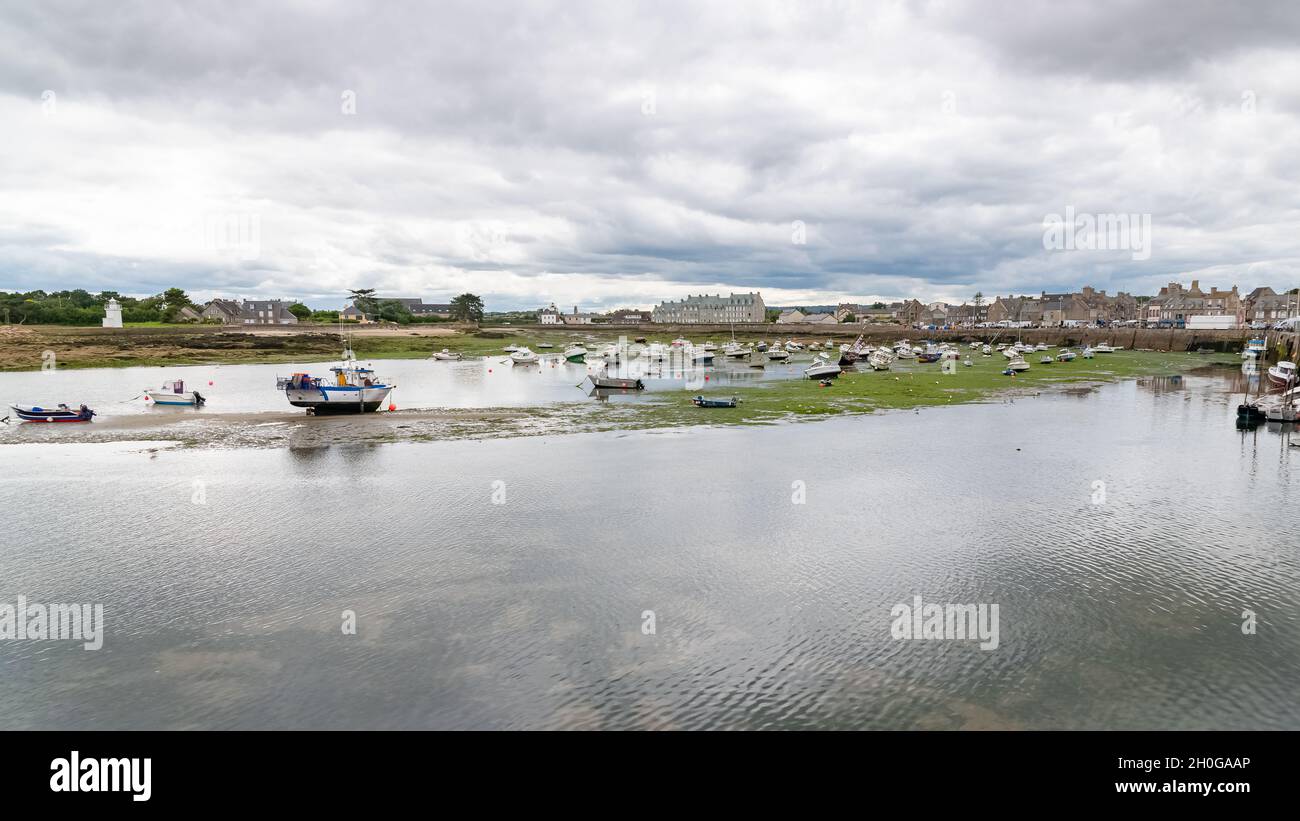 Barfleur in Normandy, the harbor, with traditional houses in background ...