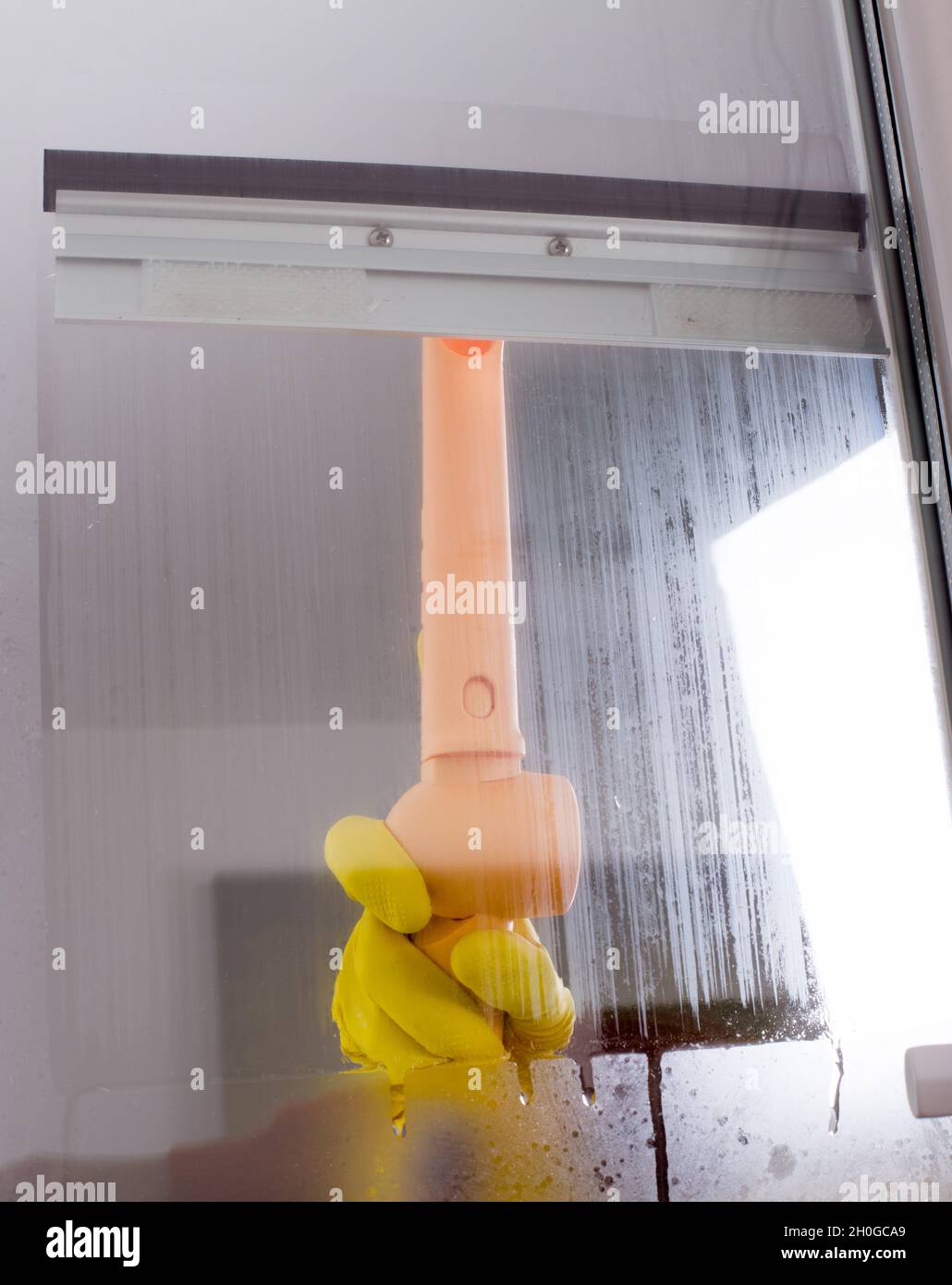 Hand wiping window hi-res stock photography and images - Alamy