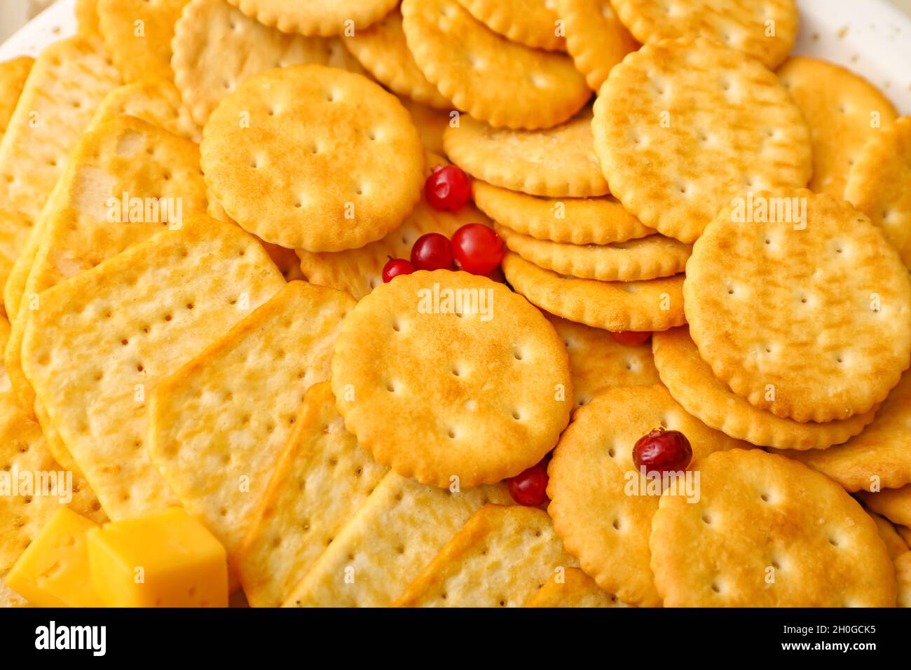 Crunchy crackers with cranberry, closeup Stock Photo - Alamy