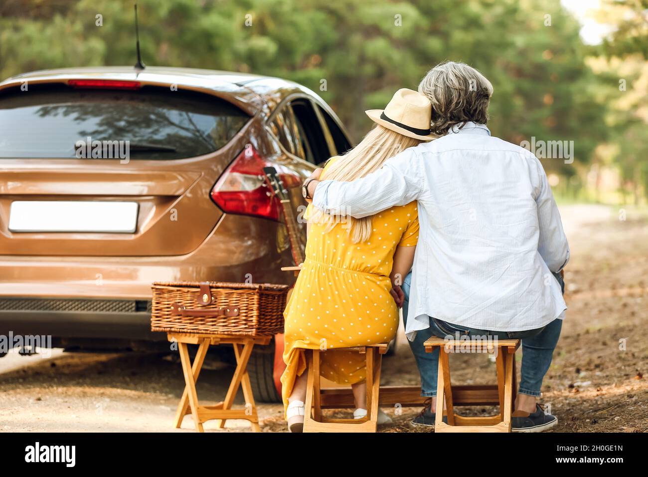 Mature couple hugging near hi-res stock photography and images - Alamy