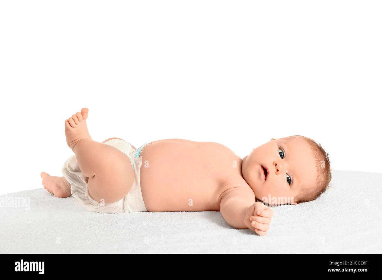 Little baby lying on white background Stock Photo - Alamy