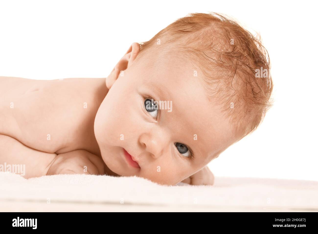 Little baby lying on white background Stock Photo - Alamy