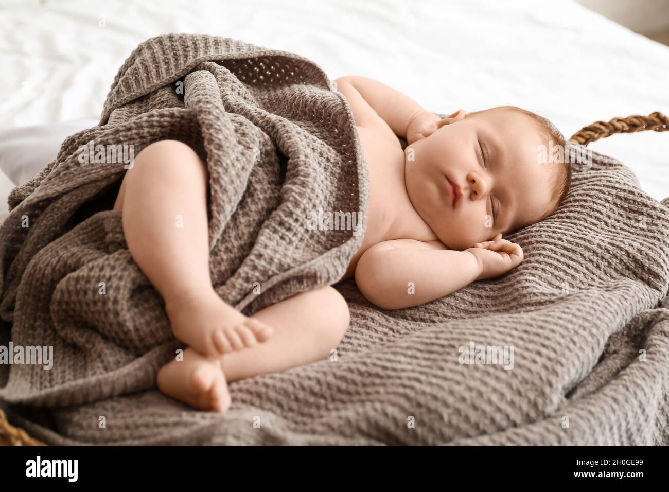 Little baby sleeping on bed Stock Photo - Alamy