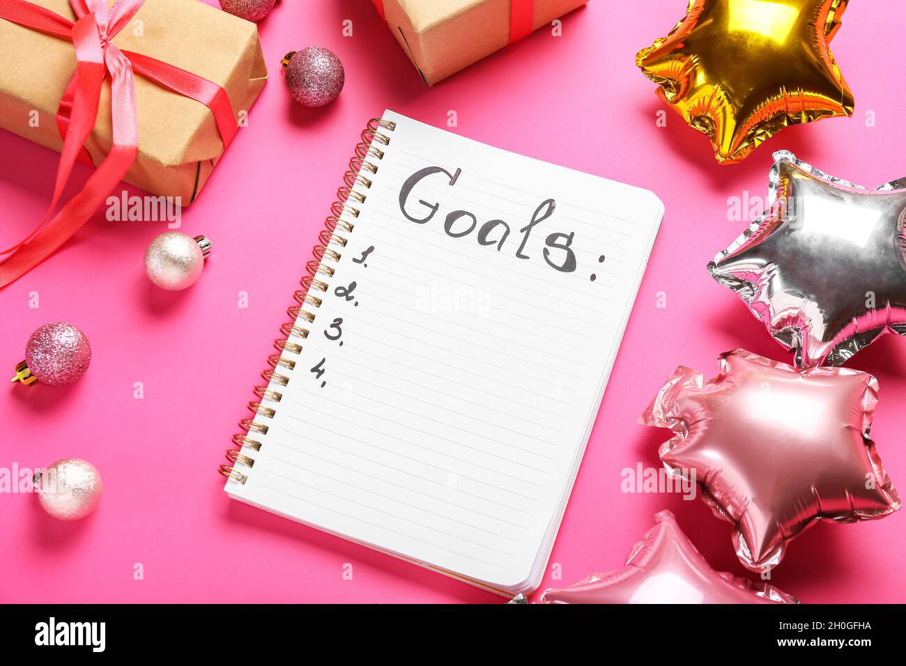 Empty to do list and gifts with decor on color background. New year ...