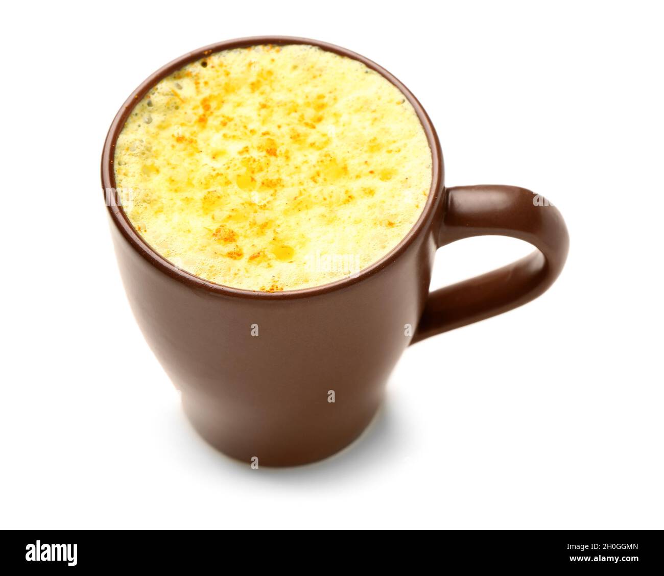 Cup of delicious homemade turmeric latte on white background Stock ...