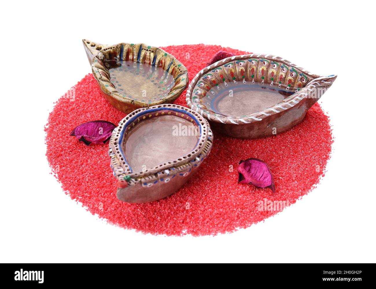 Diya lamps for Diwali with color powder on white background Stock Photo ...