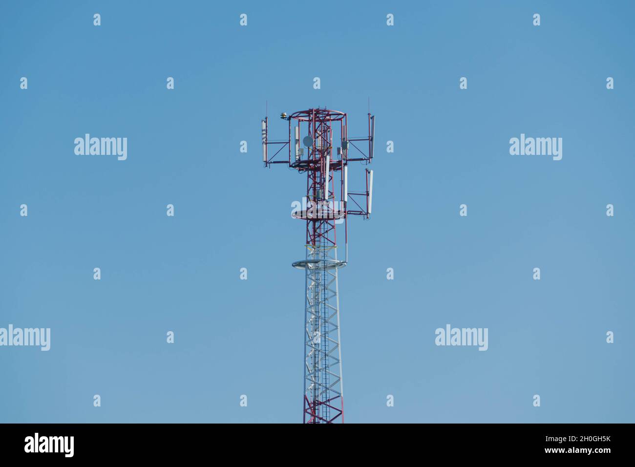 Mast, base station for mobile telephony. The metal structure is painted ...