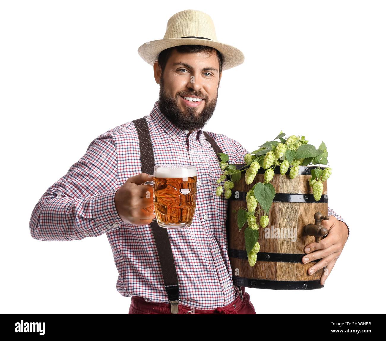 Handsome man in traditional German clothes and with beer on white ...