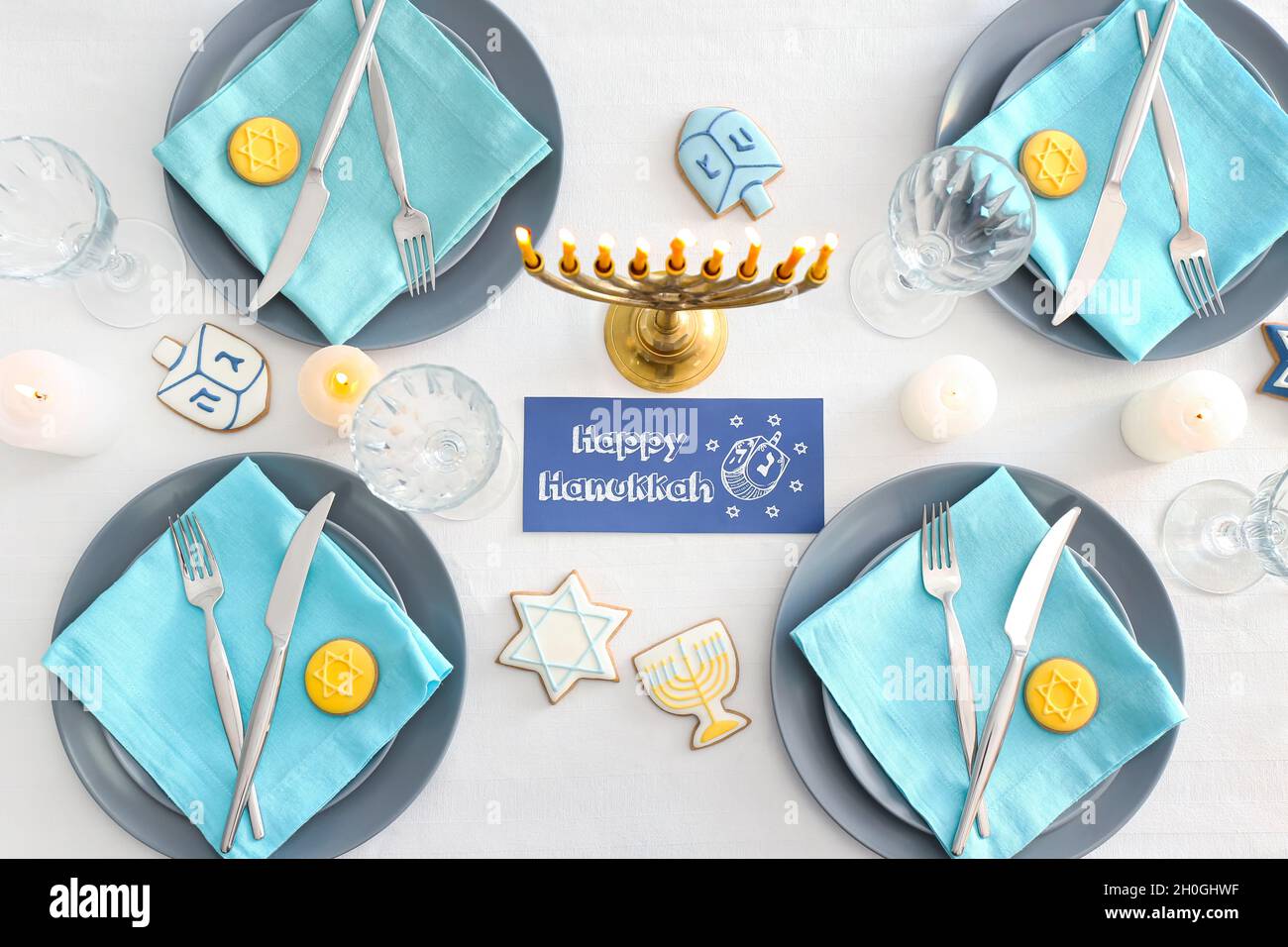 Table setting for Hanukkah celebration, top view Stock Photo - Alamy