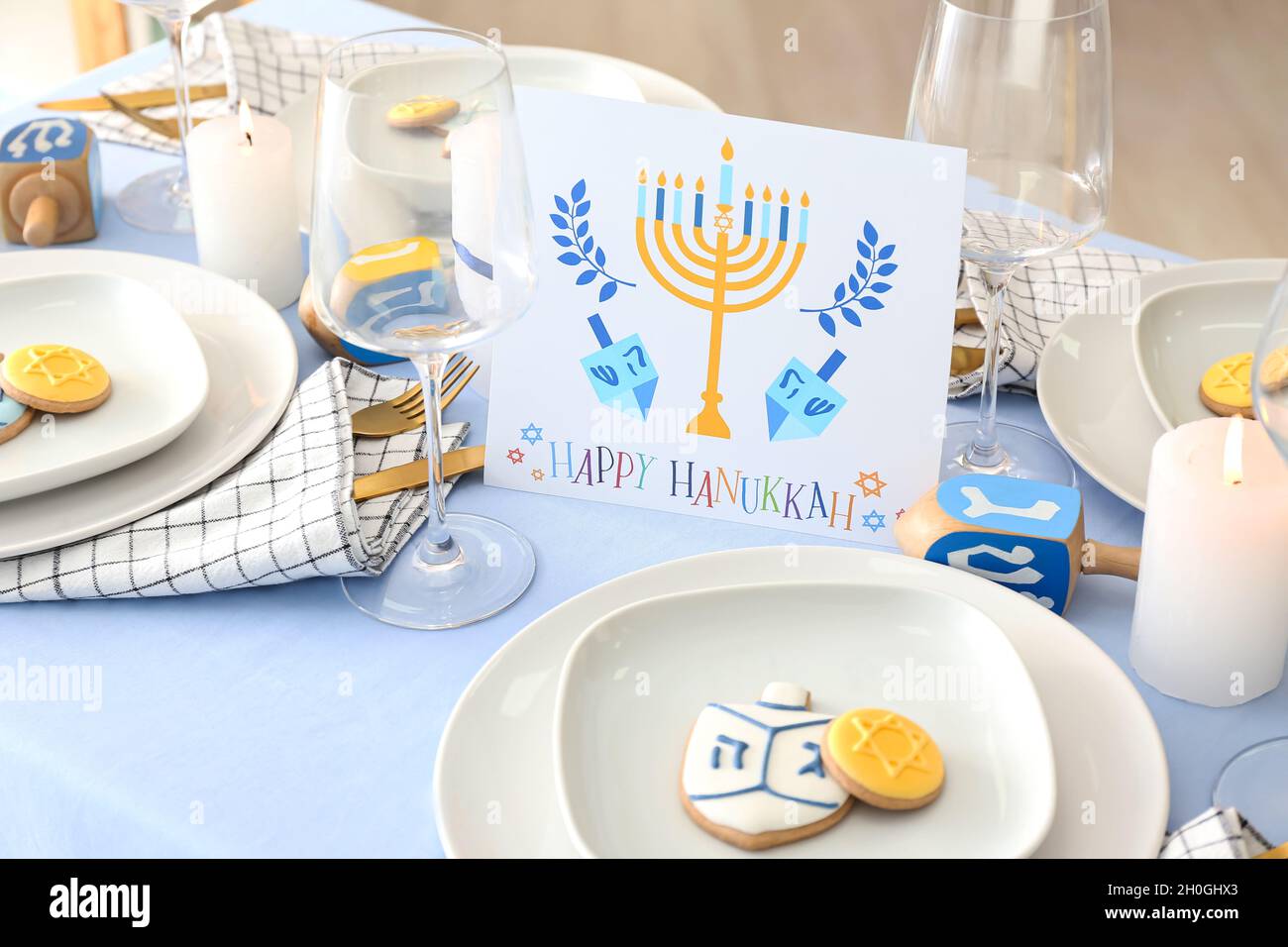 Table setting for Hanukkah celebration at home Stock Photo - Alamy