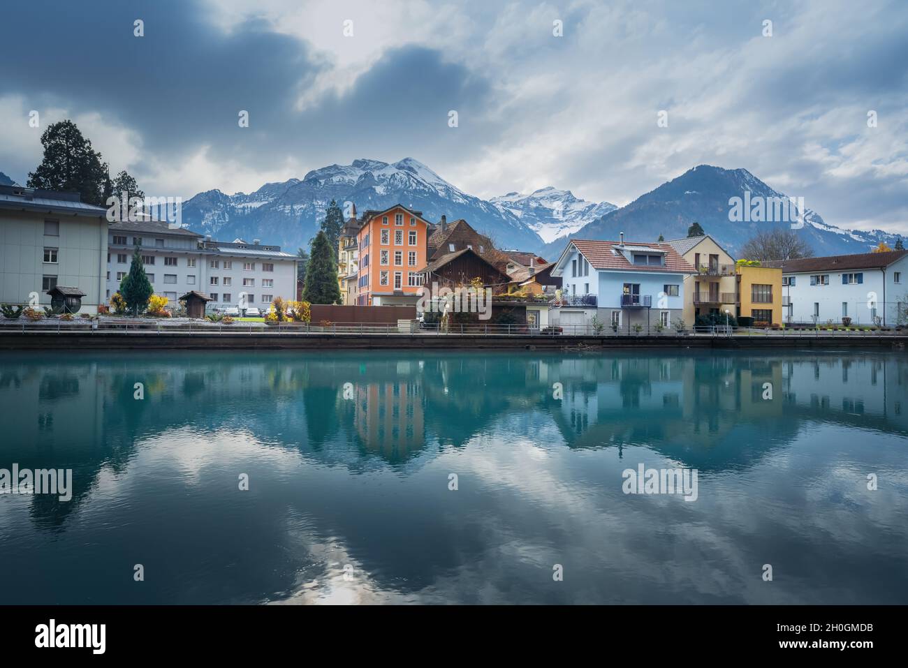 Colorful buildings in Interlaken and Aare River - Interlaken ...