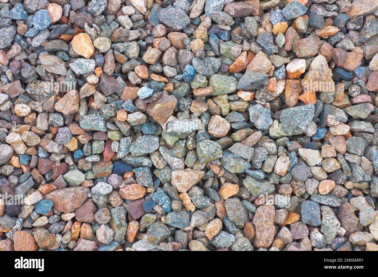 Crushed close up different stone texture background Stock Photo - Alamy