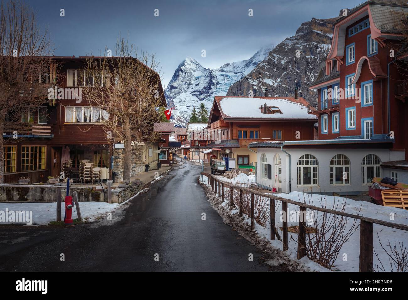 Street and buildings in Murren Village with Eiger Mountain on ...