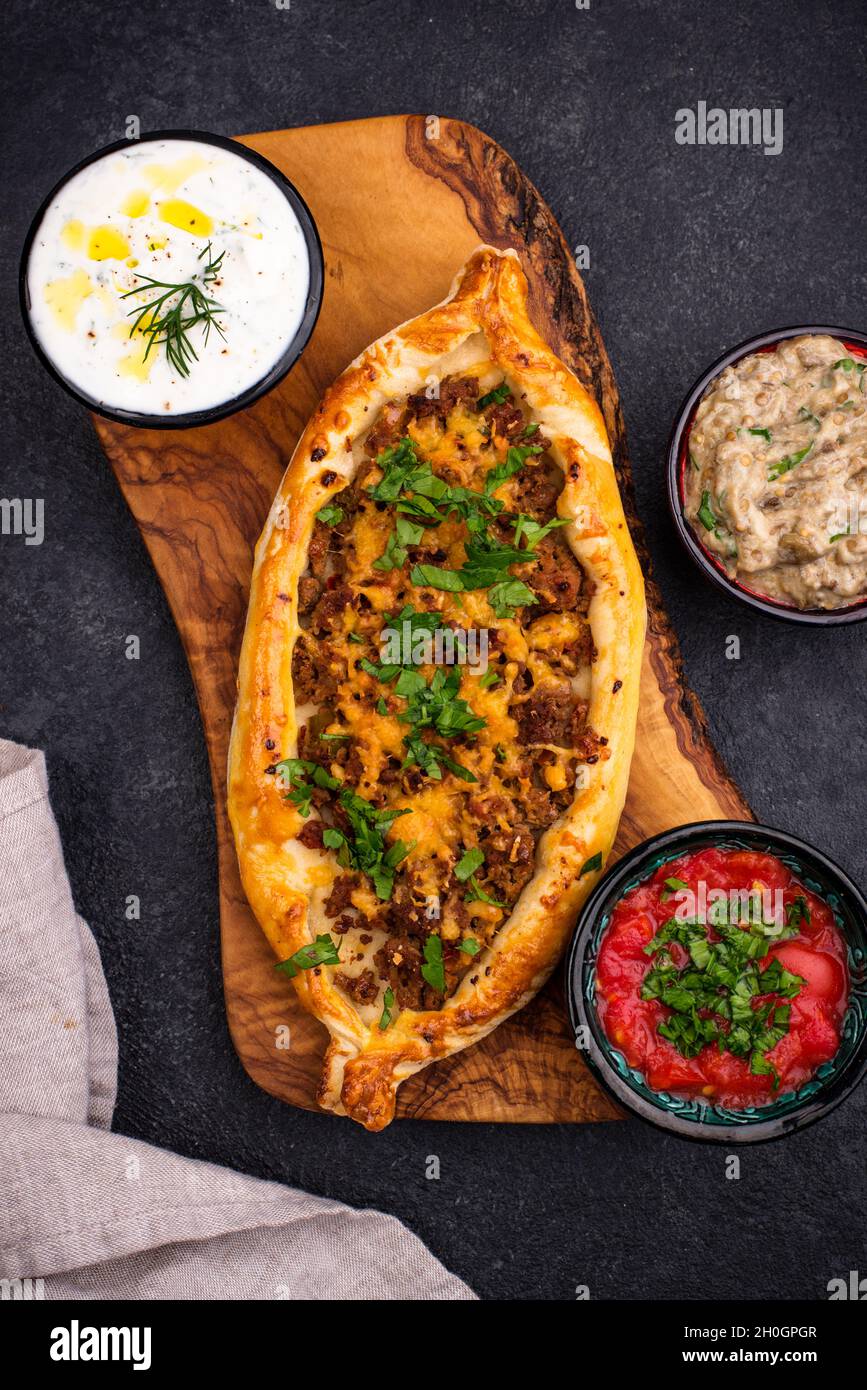Traditional Turkish pide with meat Stock Photo - Alamy
