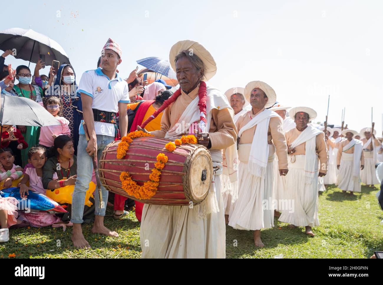 Lalitpur, Nepal - 12 Oct 2021, A Nepalese Hindu devotee plays a drum during the Sikali Jatra ...