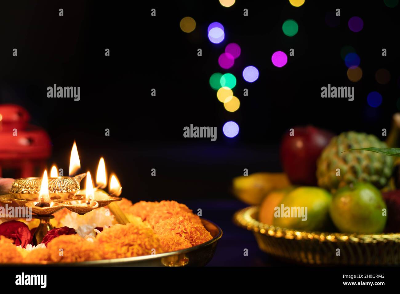 Pooja Thali With Flower Genda Phool, Peetal Diya Deep Or Panchamukhi ...