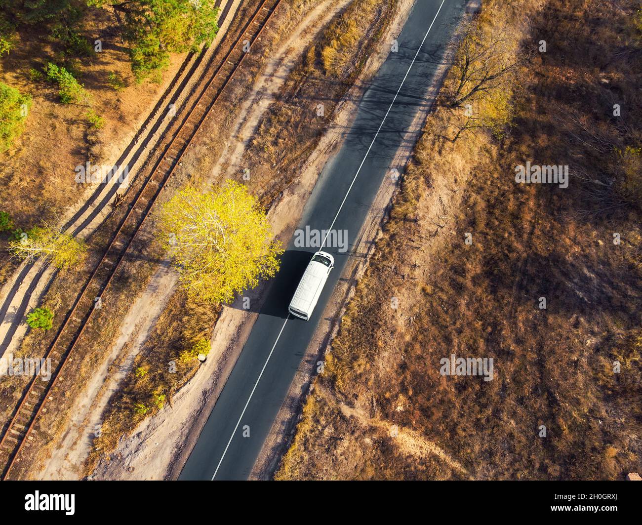 Aerial top view white modern delivery small shipment cargo courier van ...