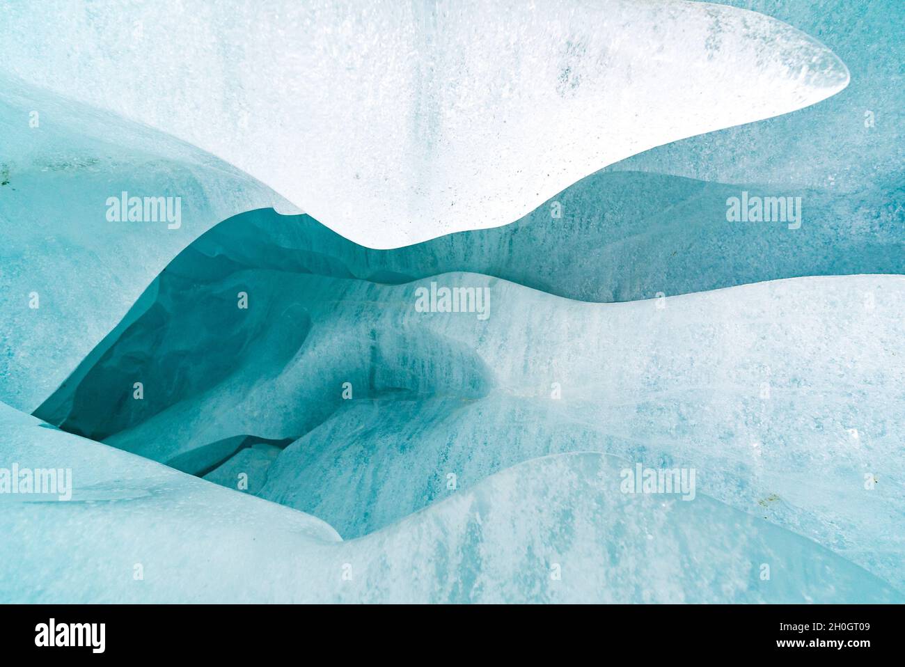 Breaking ice in glacier, ice wall texture taken from a natural glacier ...