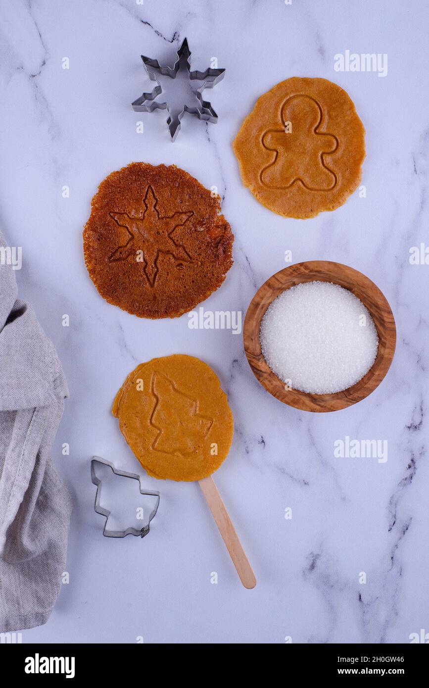 Korean dalgona sugar candy cookie Stock Photo - Alamy