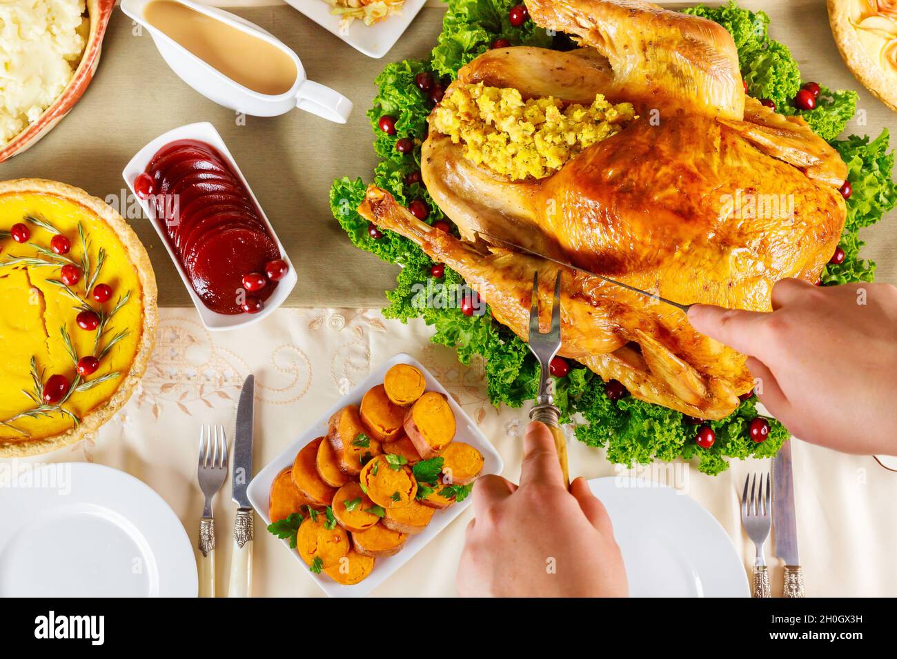 Hand cut roasted whole turkey for Thanksgiving dinner. Top view Stock ...